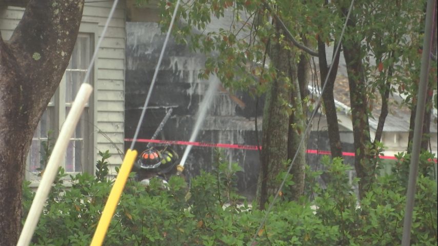 Downed powerline sparks vacant house fire amid afternoon downpour