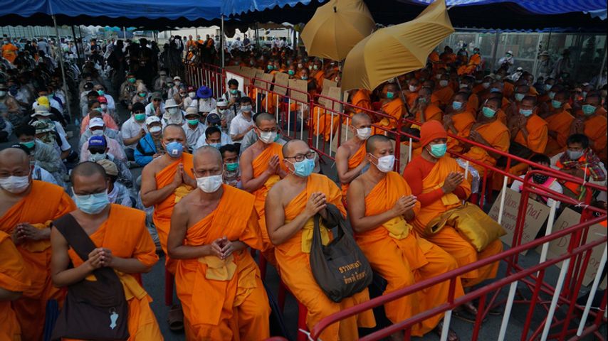 Police hunting for monk increase pressure on Thai temple