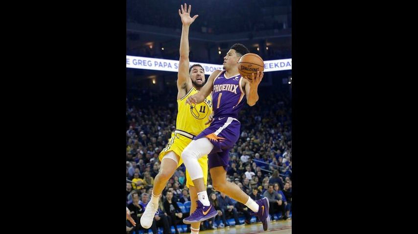 Booker, Suns snap 18-game skid to Warriors with 115-111 win