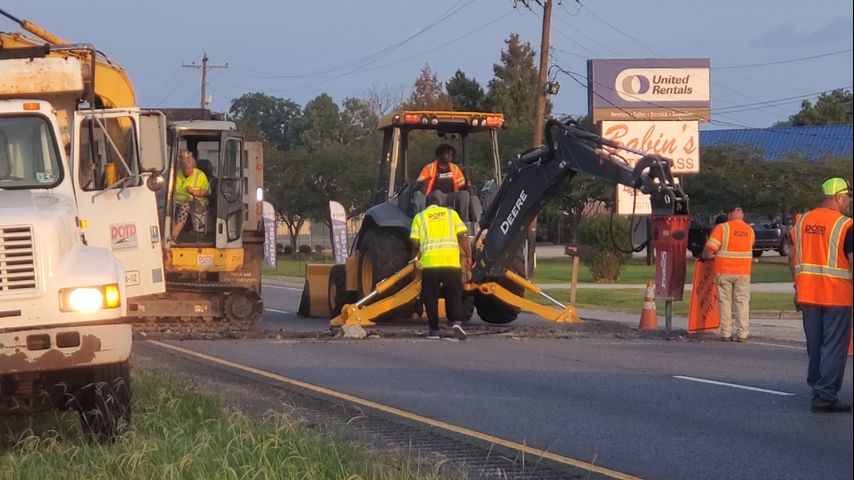 Airline Highway reopens after hours-long closure due to road buckling ...