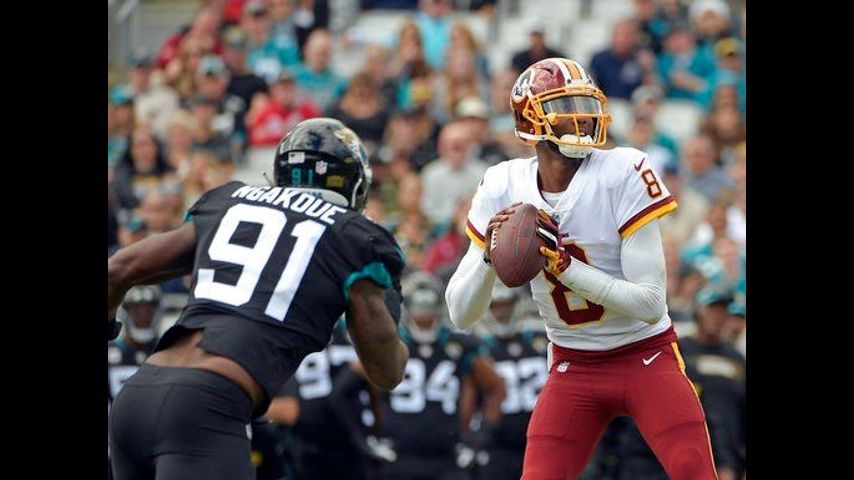 Johnson leads Redskins to late scores, 16-13 win at Jaguars