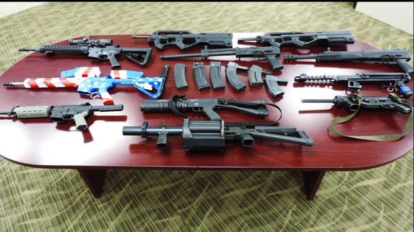 3 charged with gun store heist