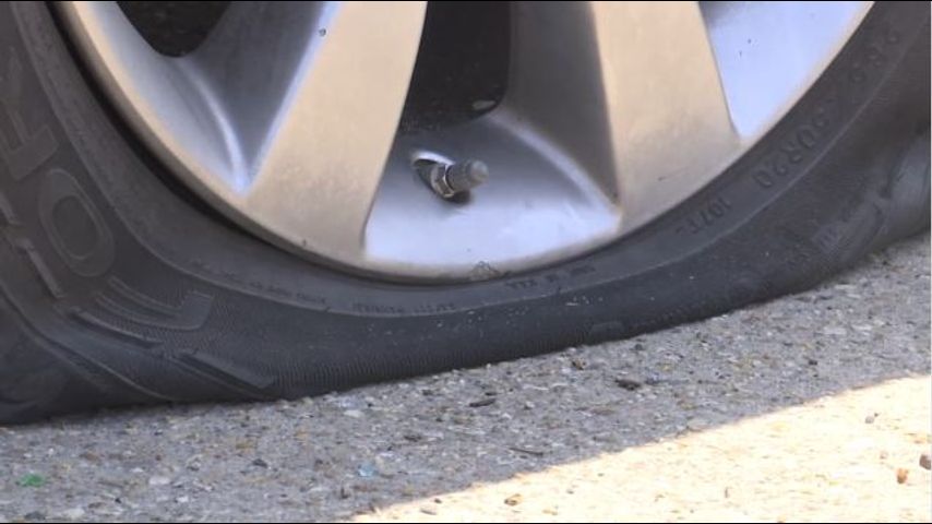 Irate customer slashes tires on a dozen cars outside bar after being ...