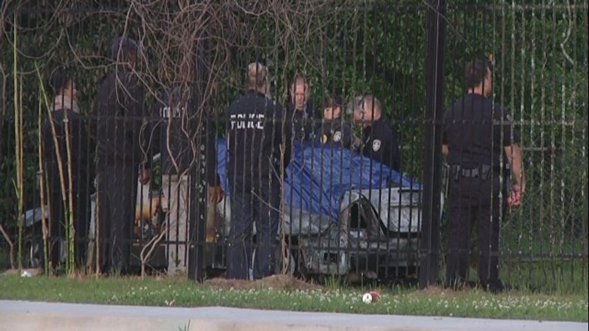 Authorities investigating body found after car fire