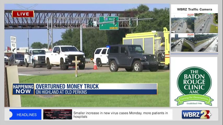 WBRZ live on site of overturned Brinks truck causing severe traffic delays
