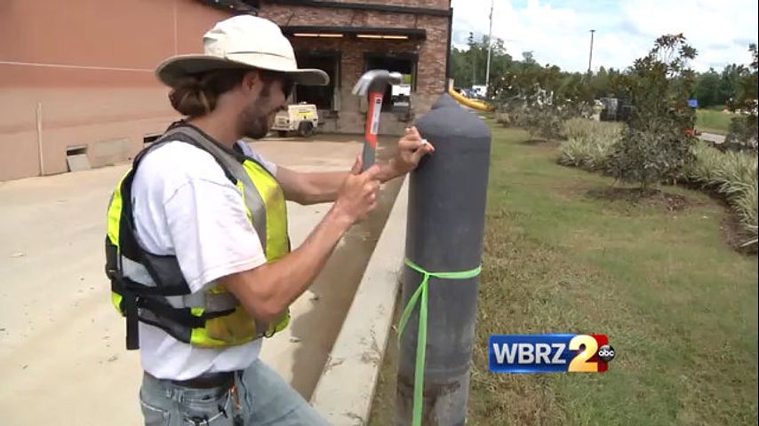 USGS measuring water marks from catastrophic flooding